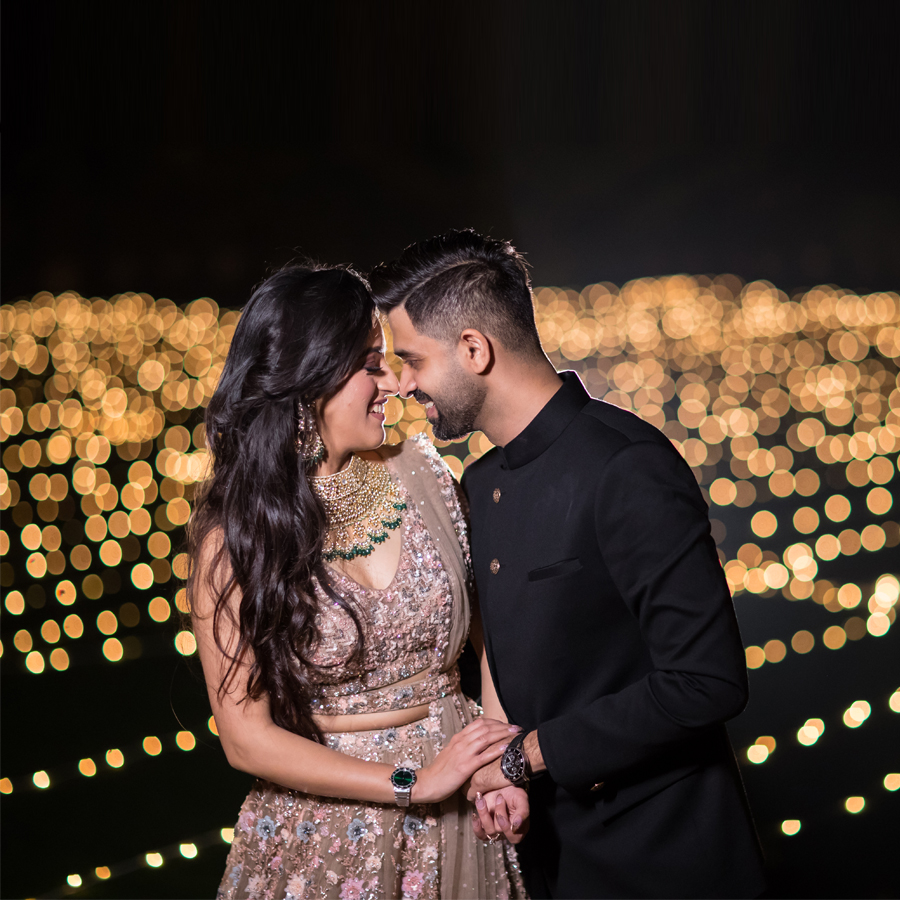 Lit up by lanterns and decorated with lush foliage, this couple’s ...